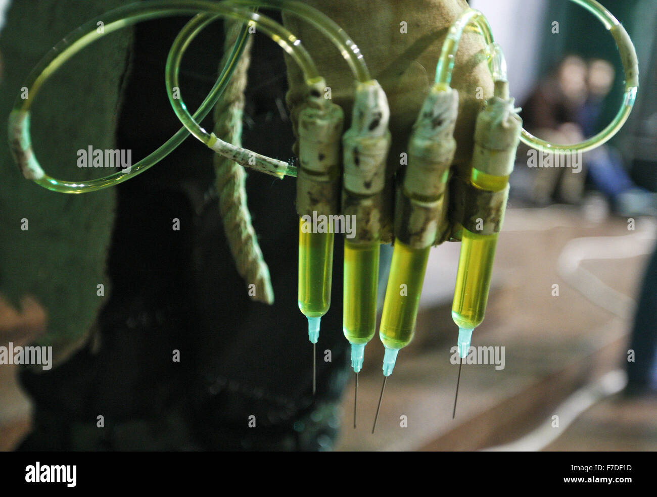 Kiev, Ukraine. 29th Nov, 2015. A hand of cosplayer with syringes ...