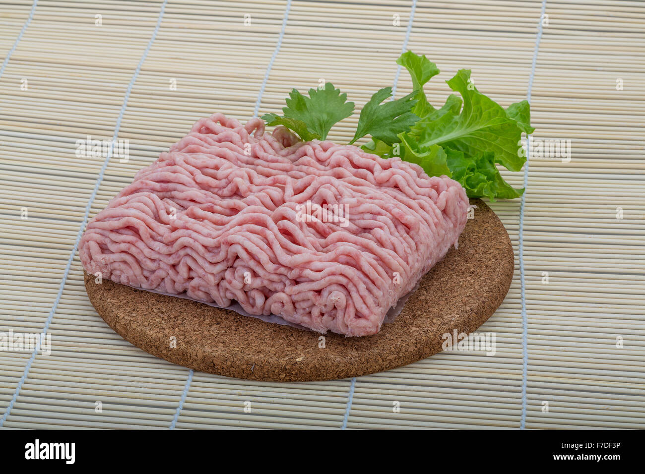 Raw minced pork meat on the desk with herbs Stock Photo - Alamy