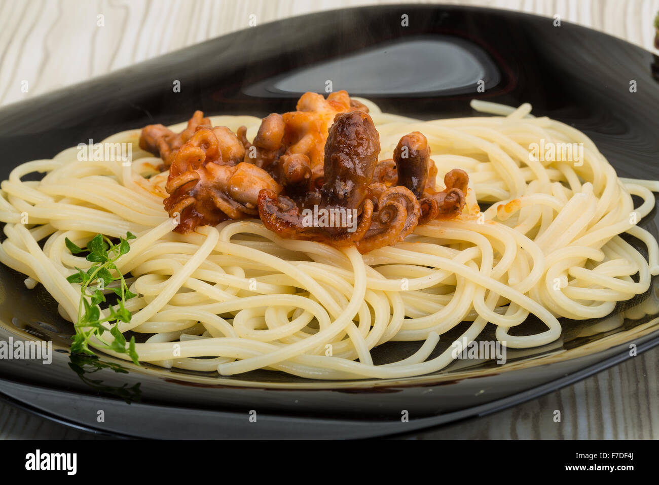 Pasta with octopus - italian spaghetti marinara Stock Photo - Alamy