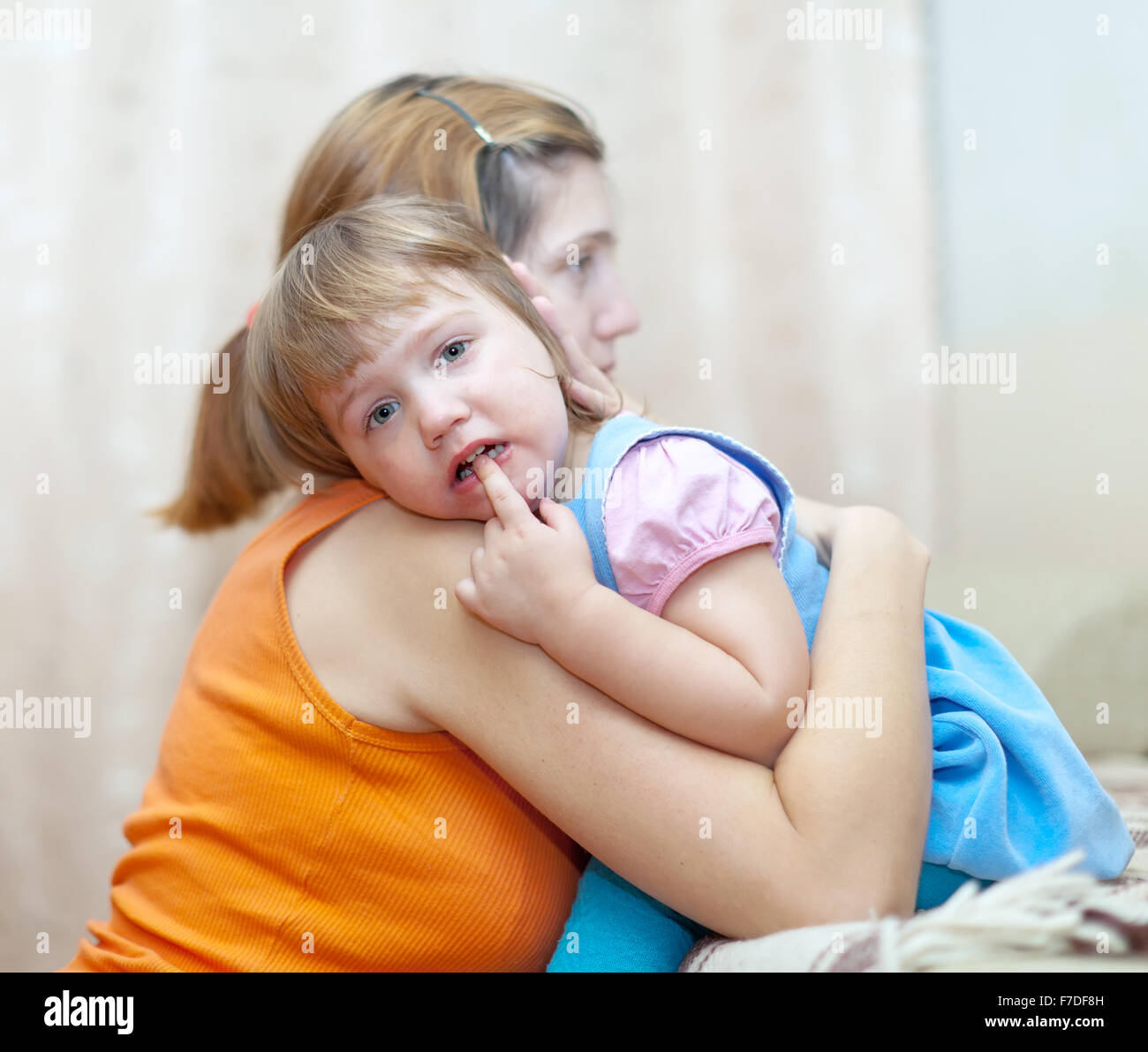 Two baby cry smile hi-res stock photography and images - Alamy