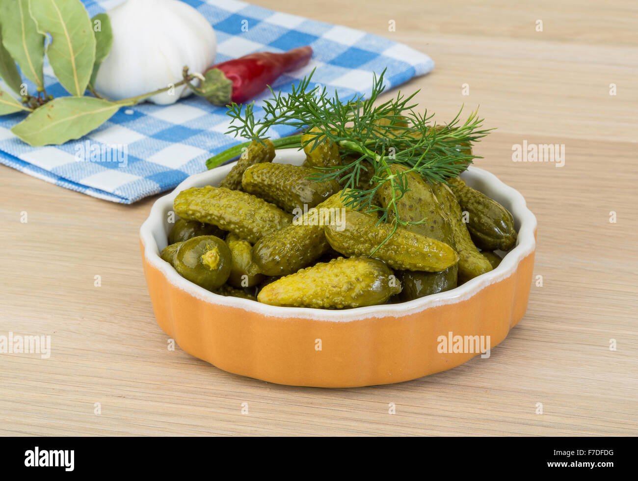 Pickled small cucumber with dill and spices Stock Photo - Alamy