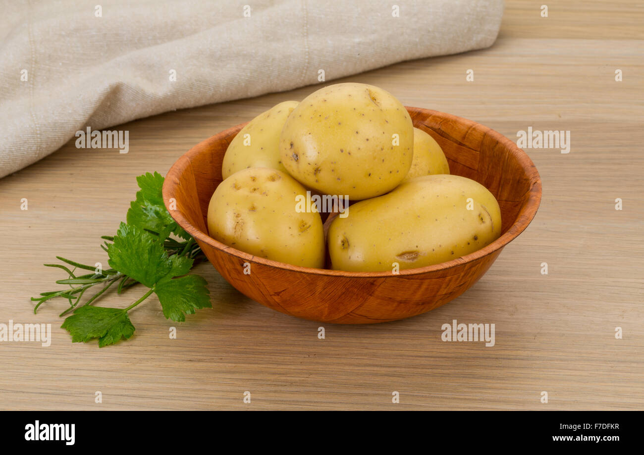 New season Raw potatoes on the desk Stock Photo - Alamy