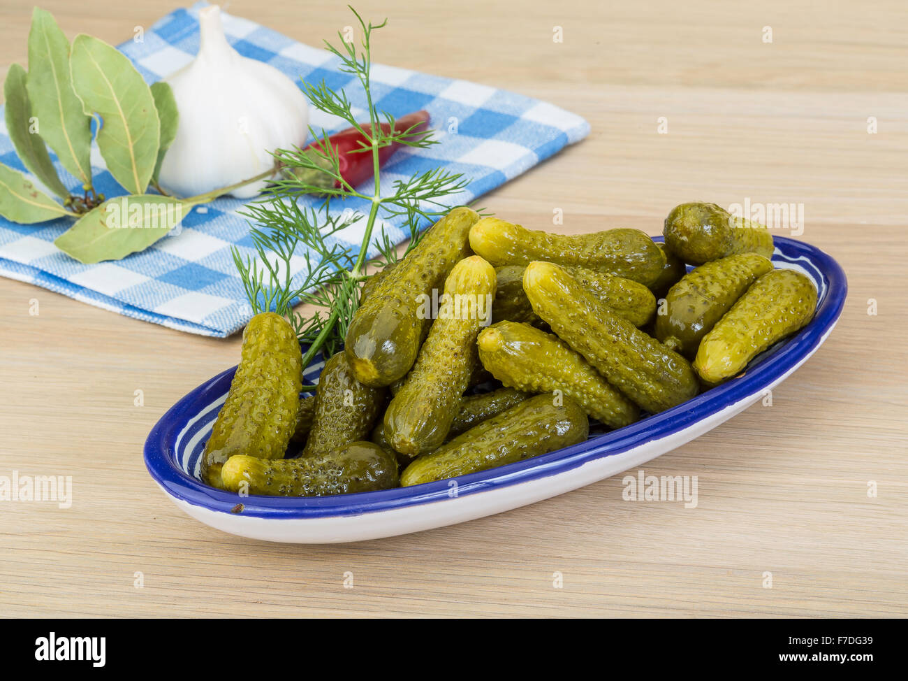 Pickled small cucumber with dill and spices Stock Photo - Alamy