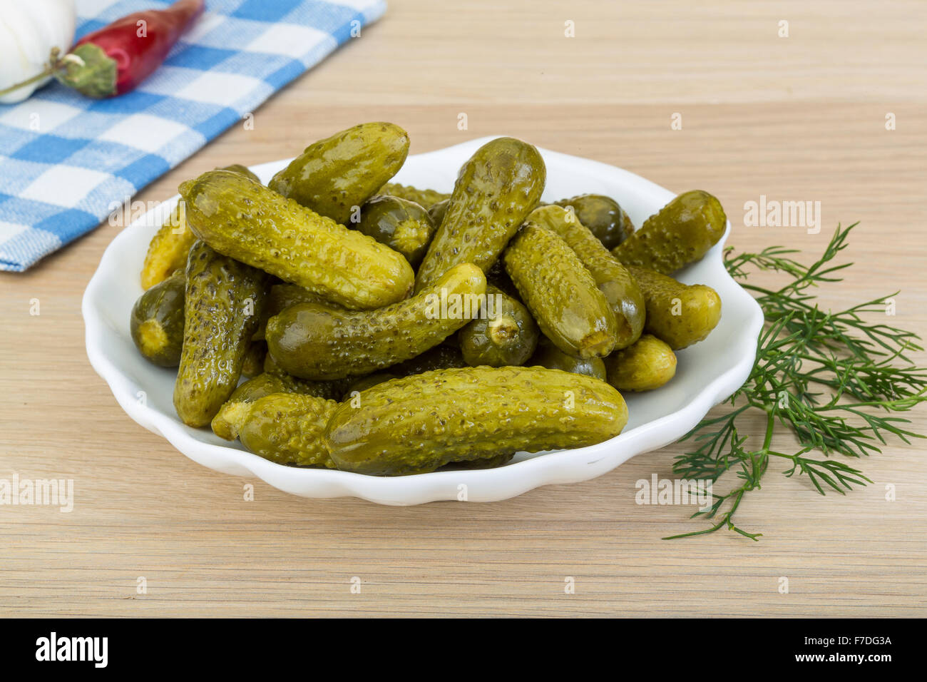 Pickled small cucumber with dill and spices Stock Photo - Alamy