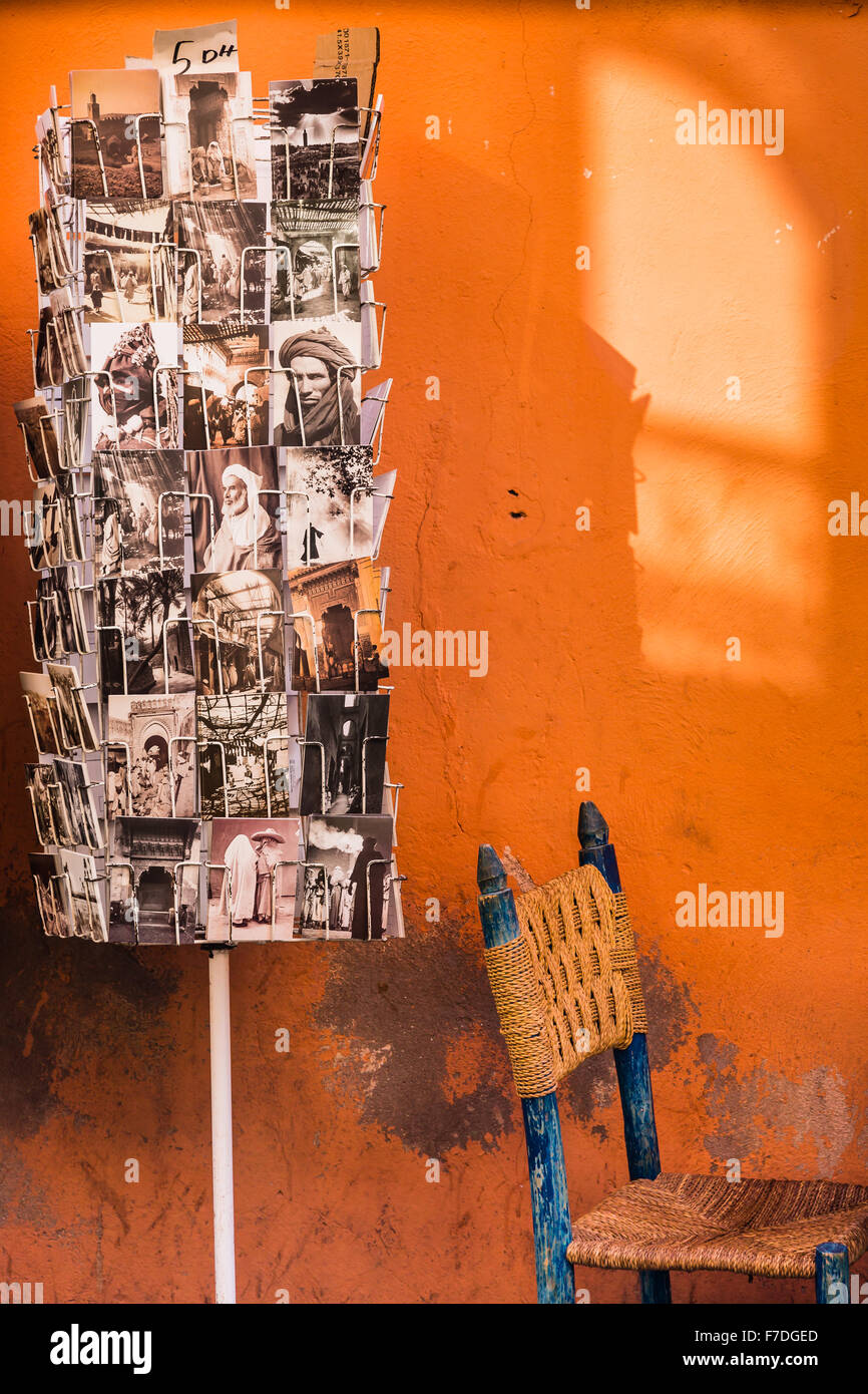 Old postcards of Morocco in Marrakesh Medina alley Stock Photo - Alamy