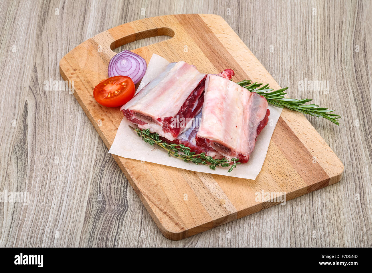 Raw beef ribs with rosemary and thyme - ready for cooking Stock Photo ...