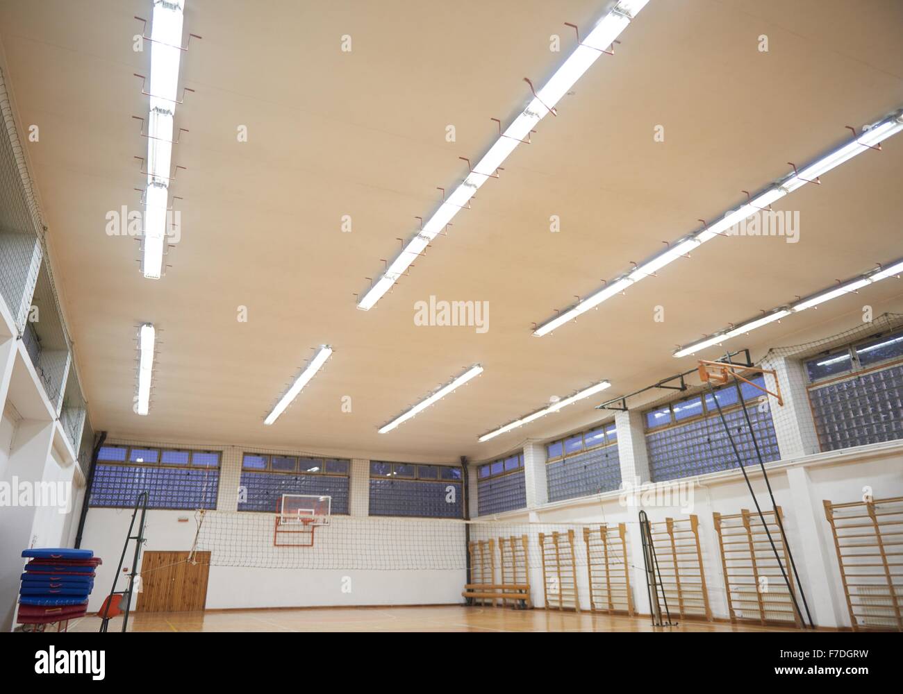 elementary school gym indoor with volleyball net Stock Photo - Alamy