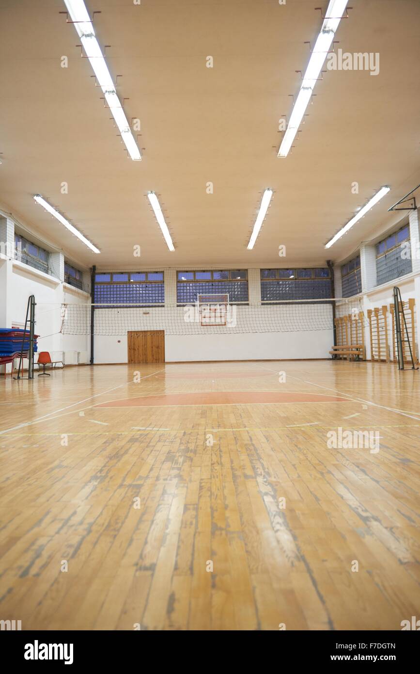 elementary school gym indoor with volleyball net Stock Photo - Alamy