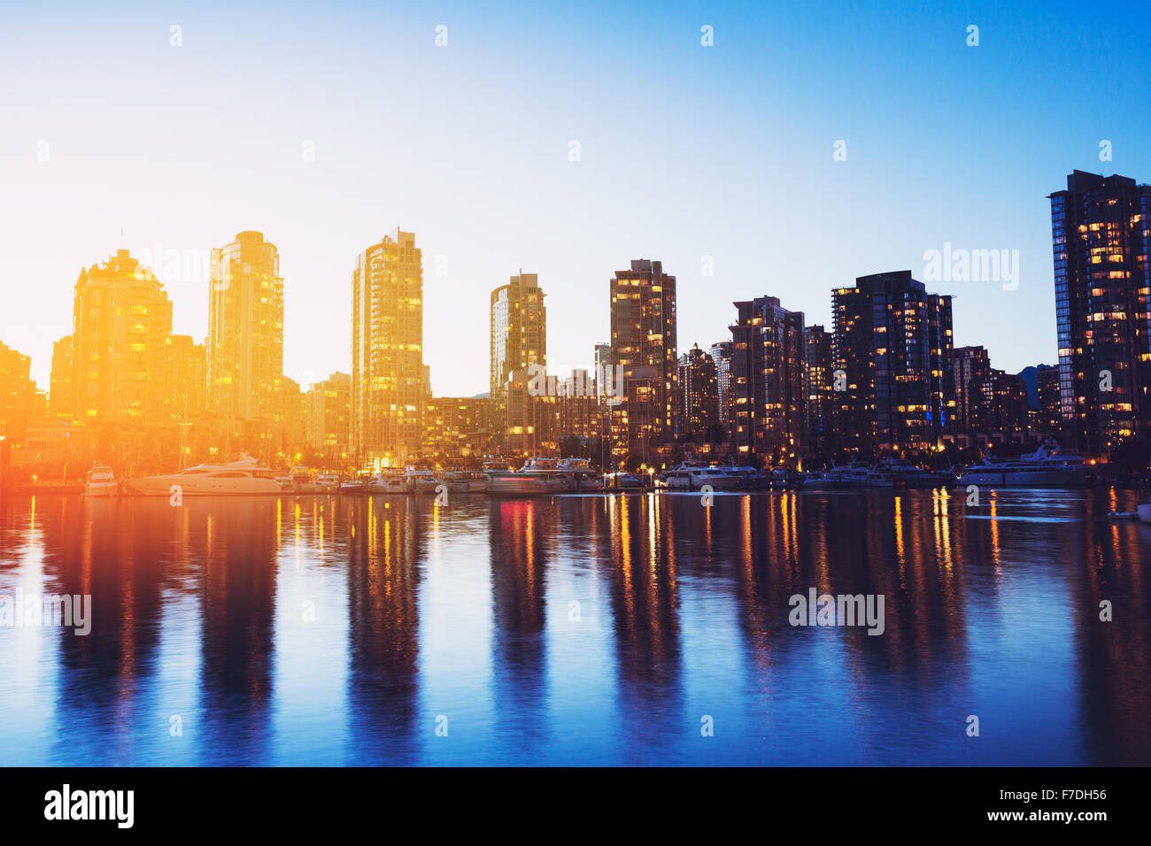 View of City Skyline at Sunset Stock Photo - Alamy