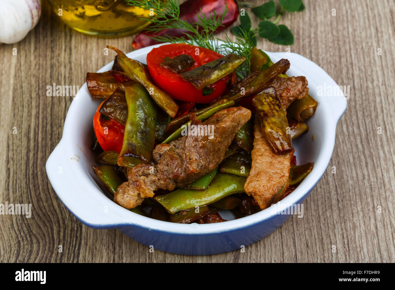 Asian cuisine - Stir fried pork with vegetables Stock Photo - Alamy