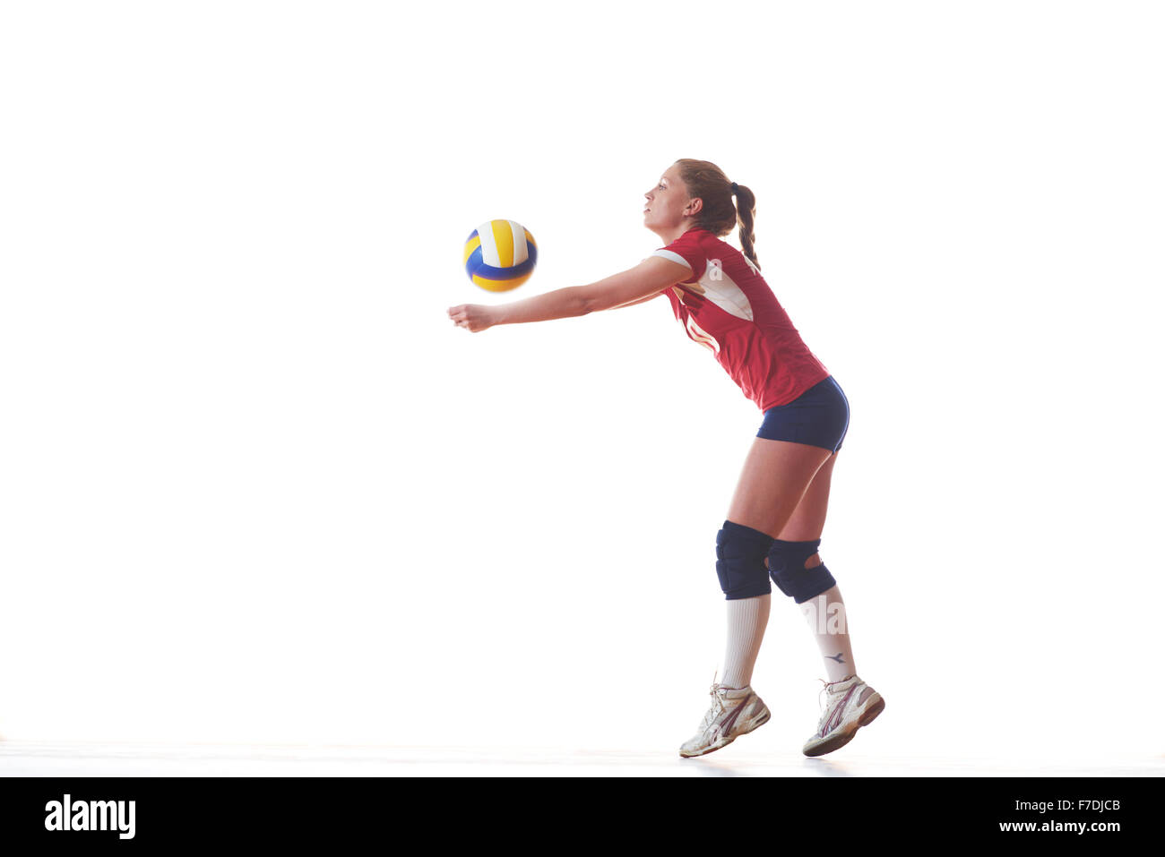 volleyball woman jump and kick ball isolated on white background Stock ...