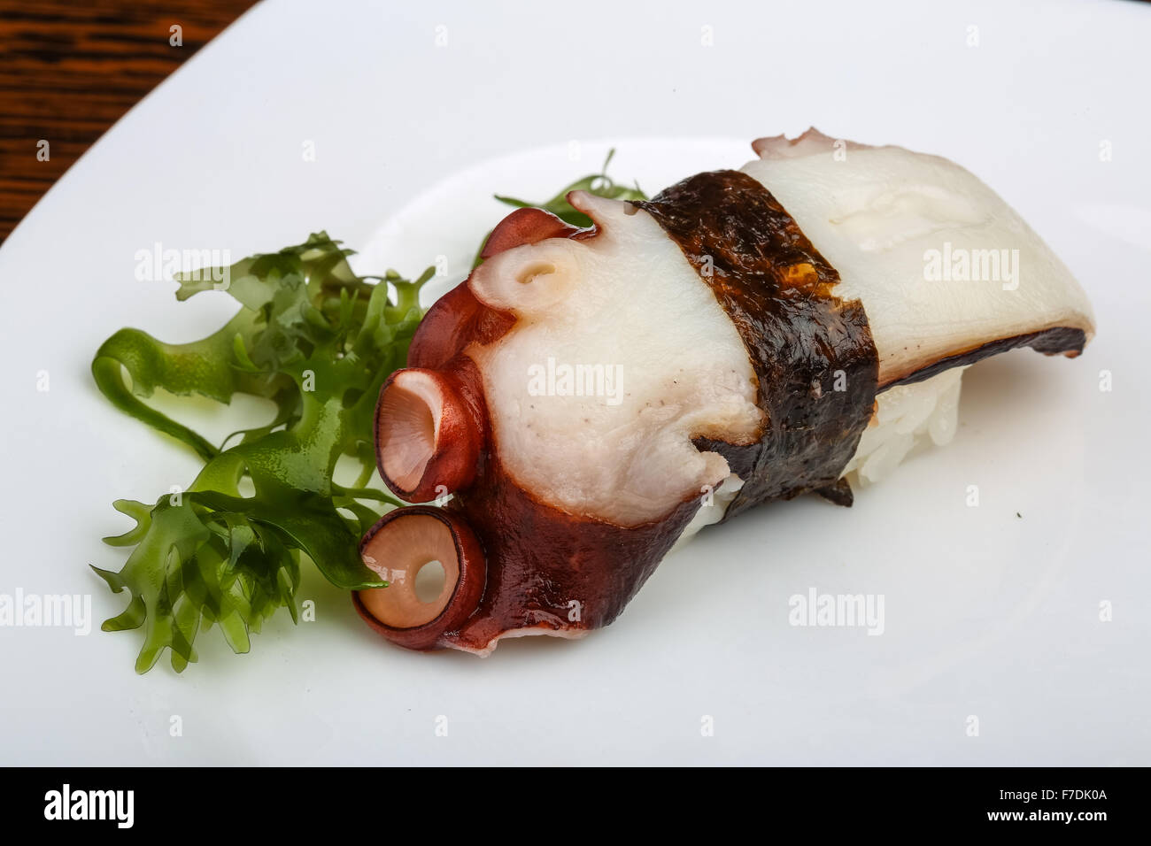 Cold fresh Octopus sushi with nori and nori Stock Photo - Alamy