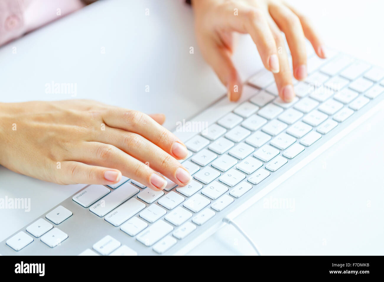 Typing female office worker hi-res stock photography and images - Alamy