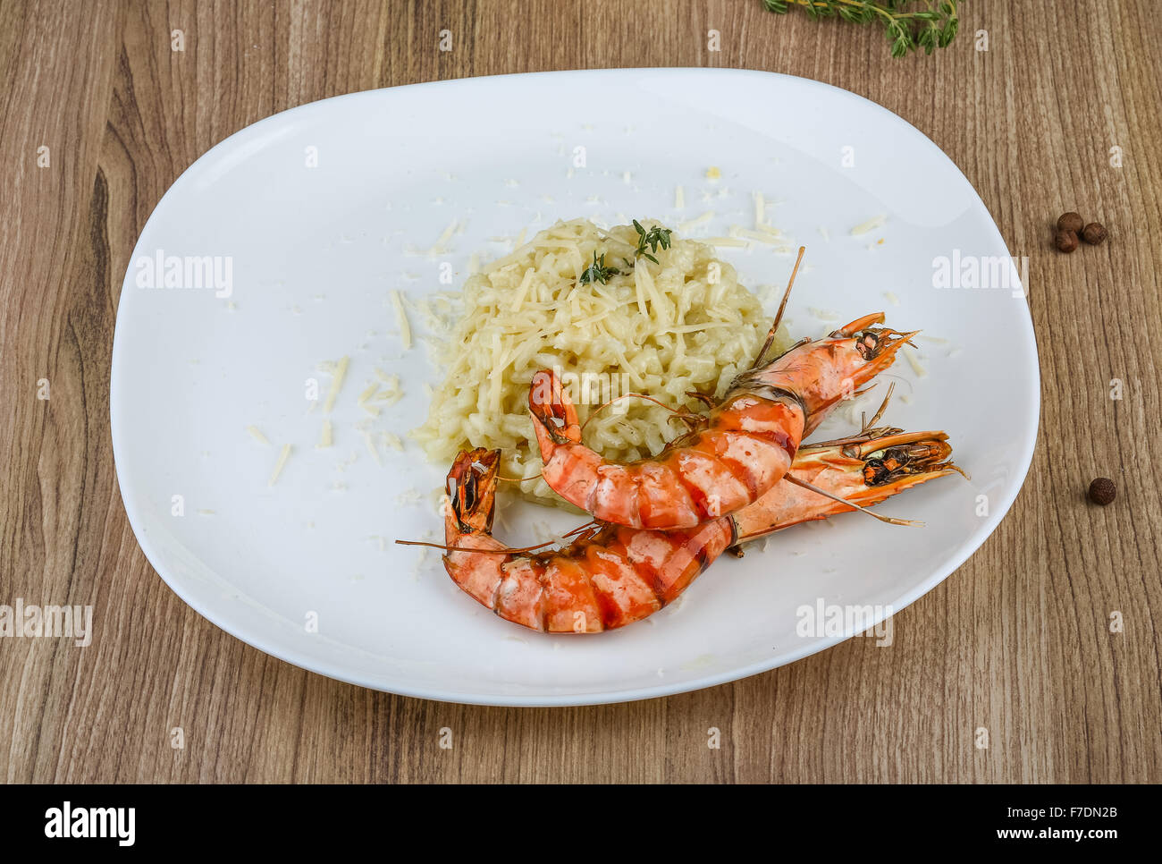 Italian trditional Risotto with tiger prawn and thyme Stock Photo - Alamy