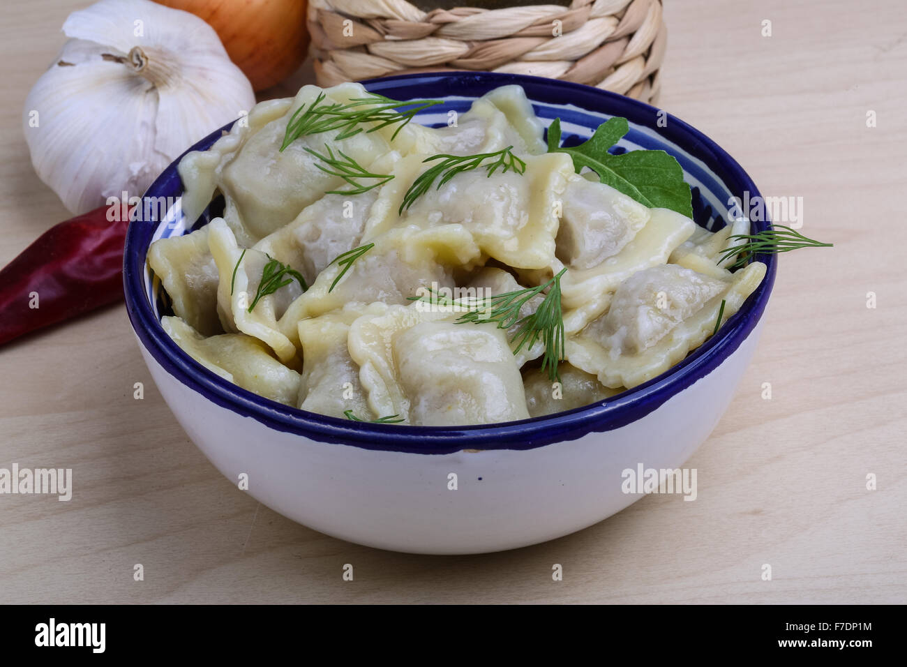 Italian dumplings Ravioli with fresh herbs and spices Stock Photo - Alamy