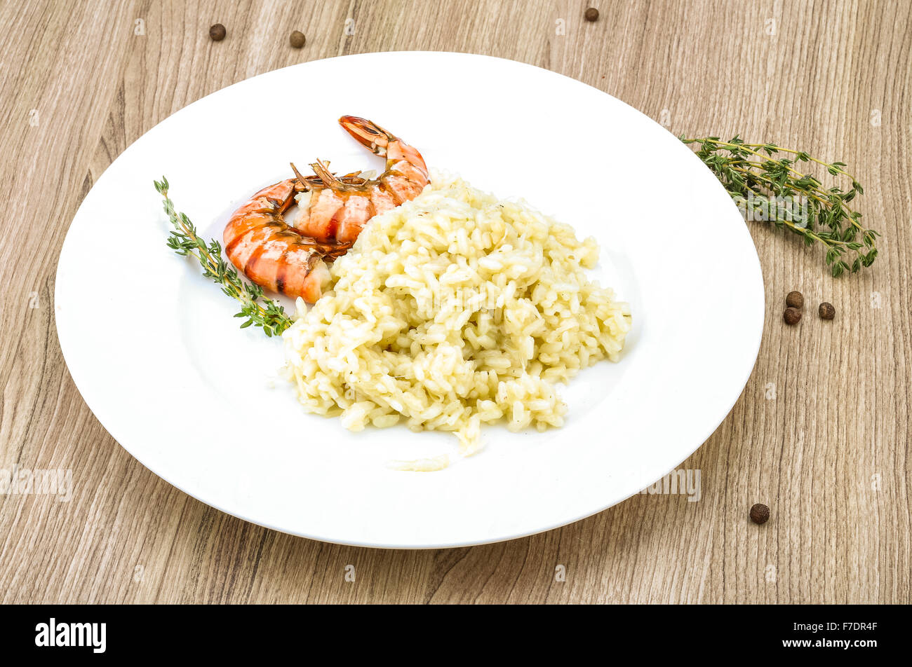 Italian trditional Risotto with tiger prawn and thyme Stock Photo - Alamy