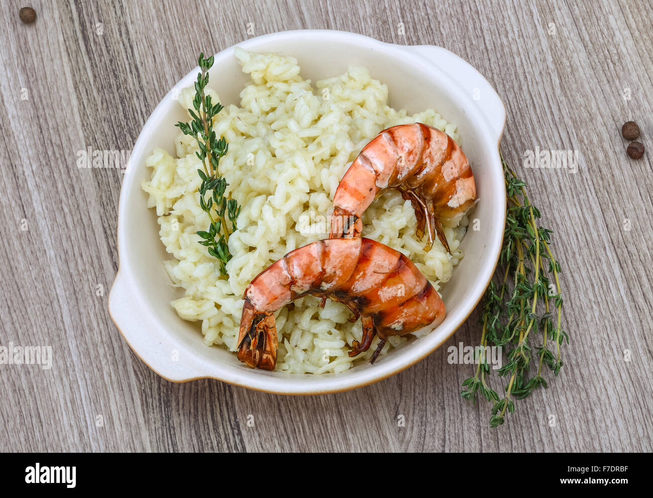 Italian trditional Risotto with tiger prawn and thyme Stock Photo - Alamy