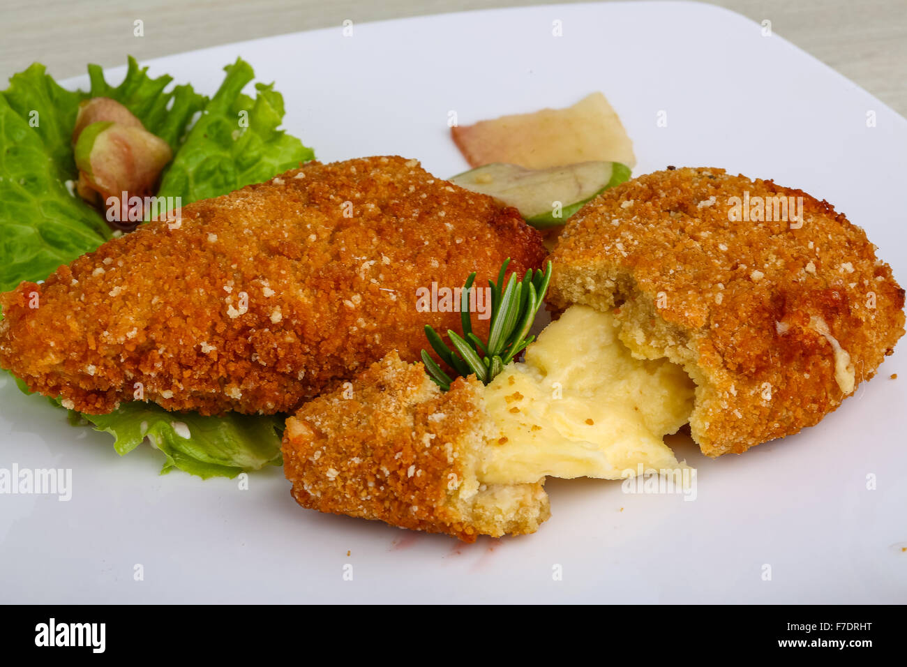 Fried cheese sticks in pan with rosemary Stock Photo - Alamy