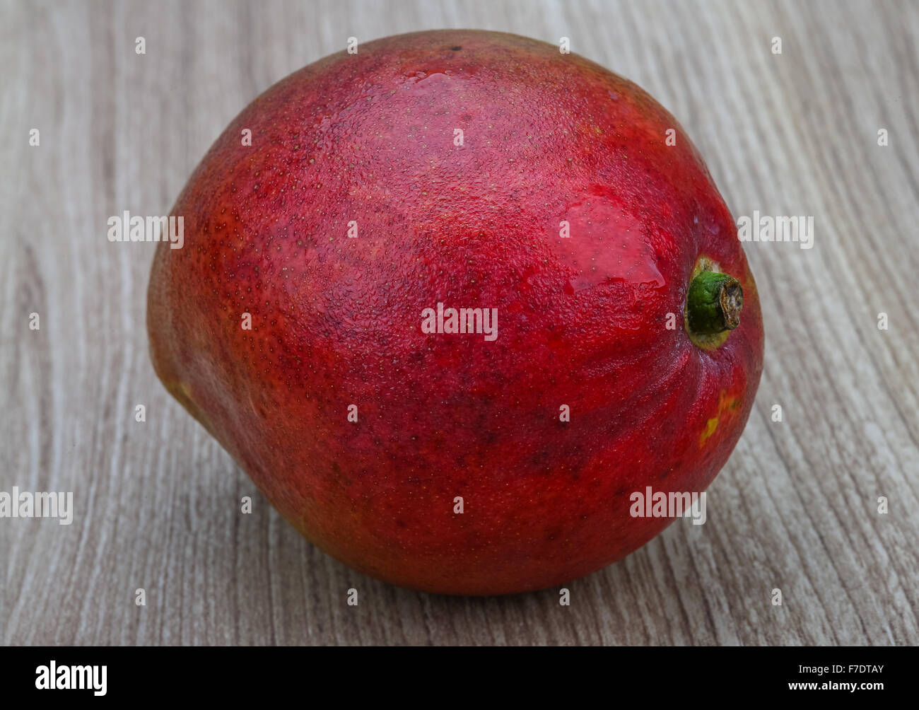 Fresh ripe mango fruit on the wood background Stock Photo - Alamy