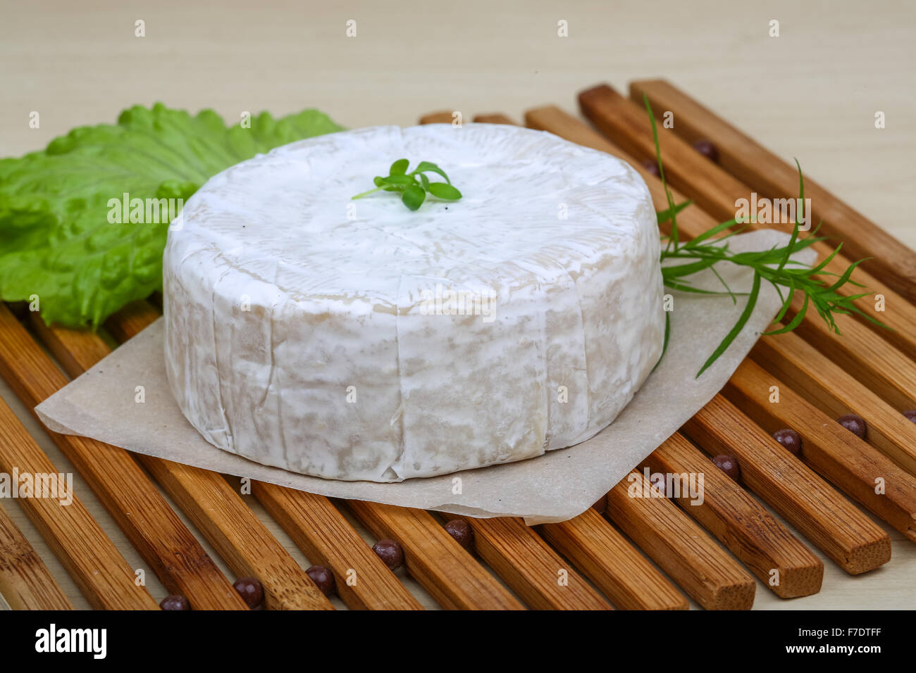 Camembert brie cheese with herbs on the wood background Stock Photo - Alamy