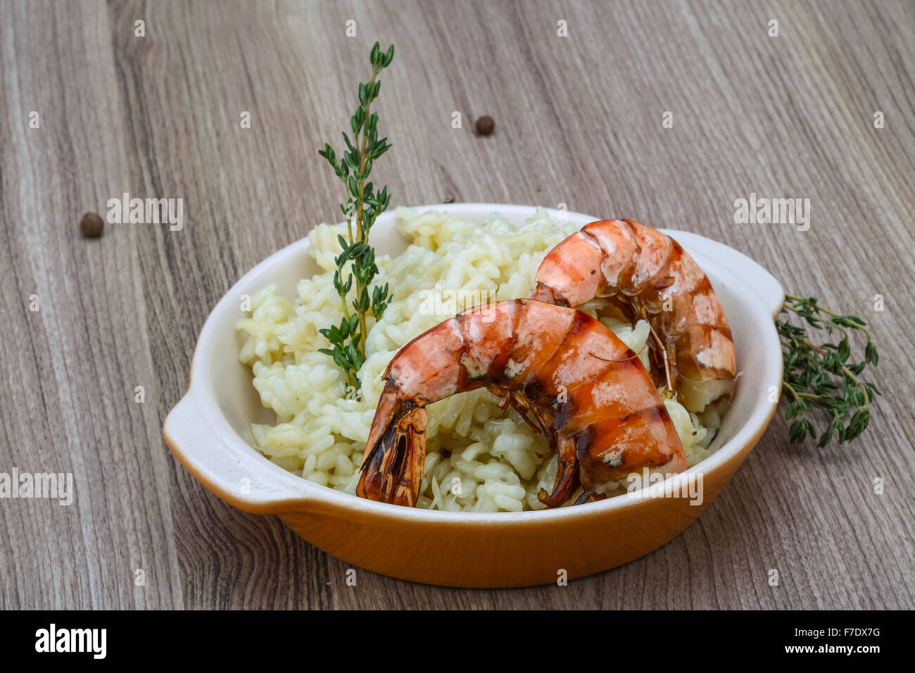 Italian trditional Risotto with tiger prawn and thyme Stock Photo - Alamy