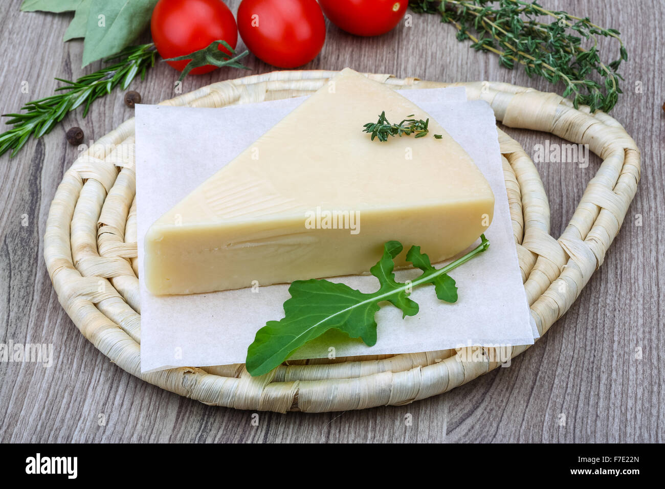 Italian trditional Parmesan cheese with herbs and tomato cherry Stock ...