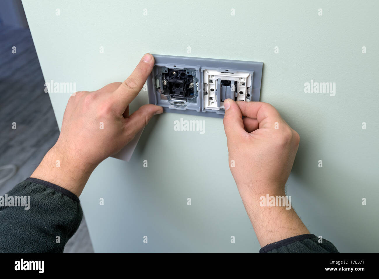 electrician installing the electricity system Stock Photo - Alamy