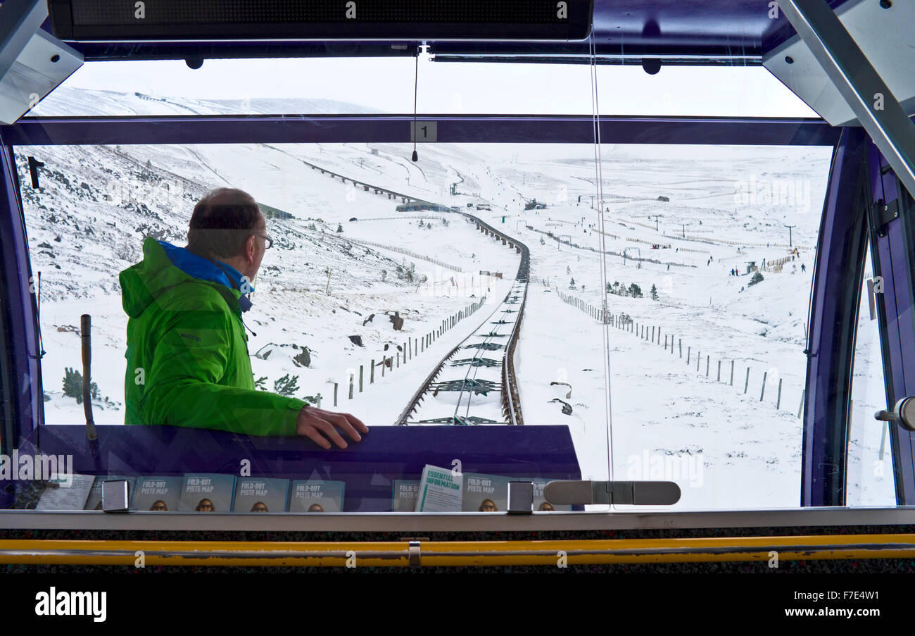 View through glass partition to driver in the cab of Funicular train ...