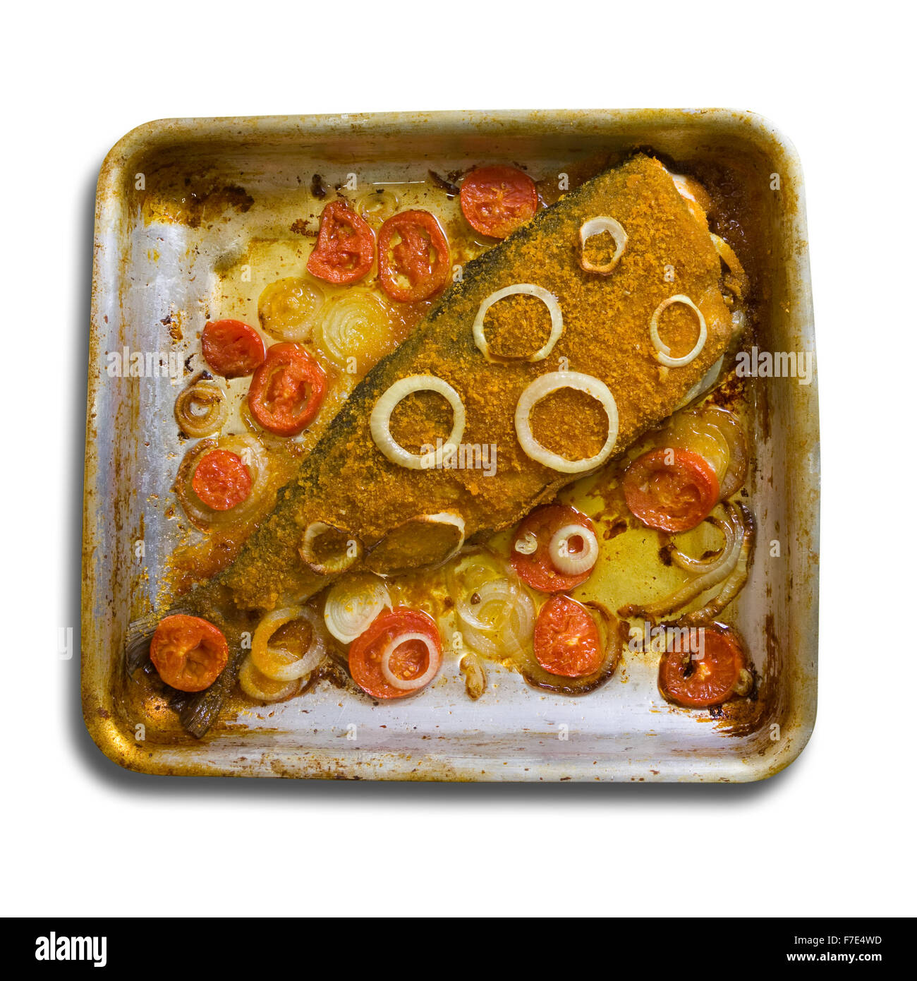 breaded fish in roasting pan. Isolated over white Stock Photo - Alamy