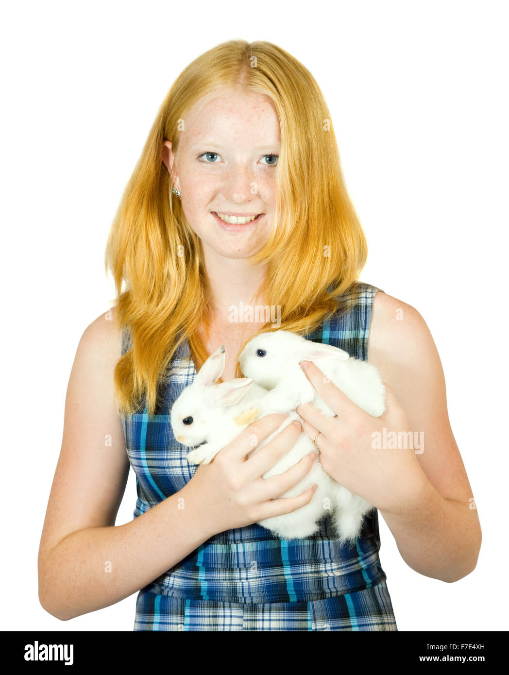 Teen girl with rabbit, isolated on white background Stock Photo - Alamy