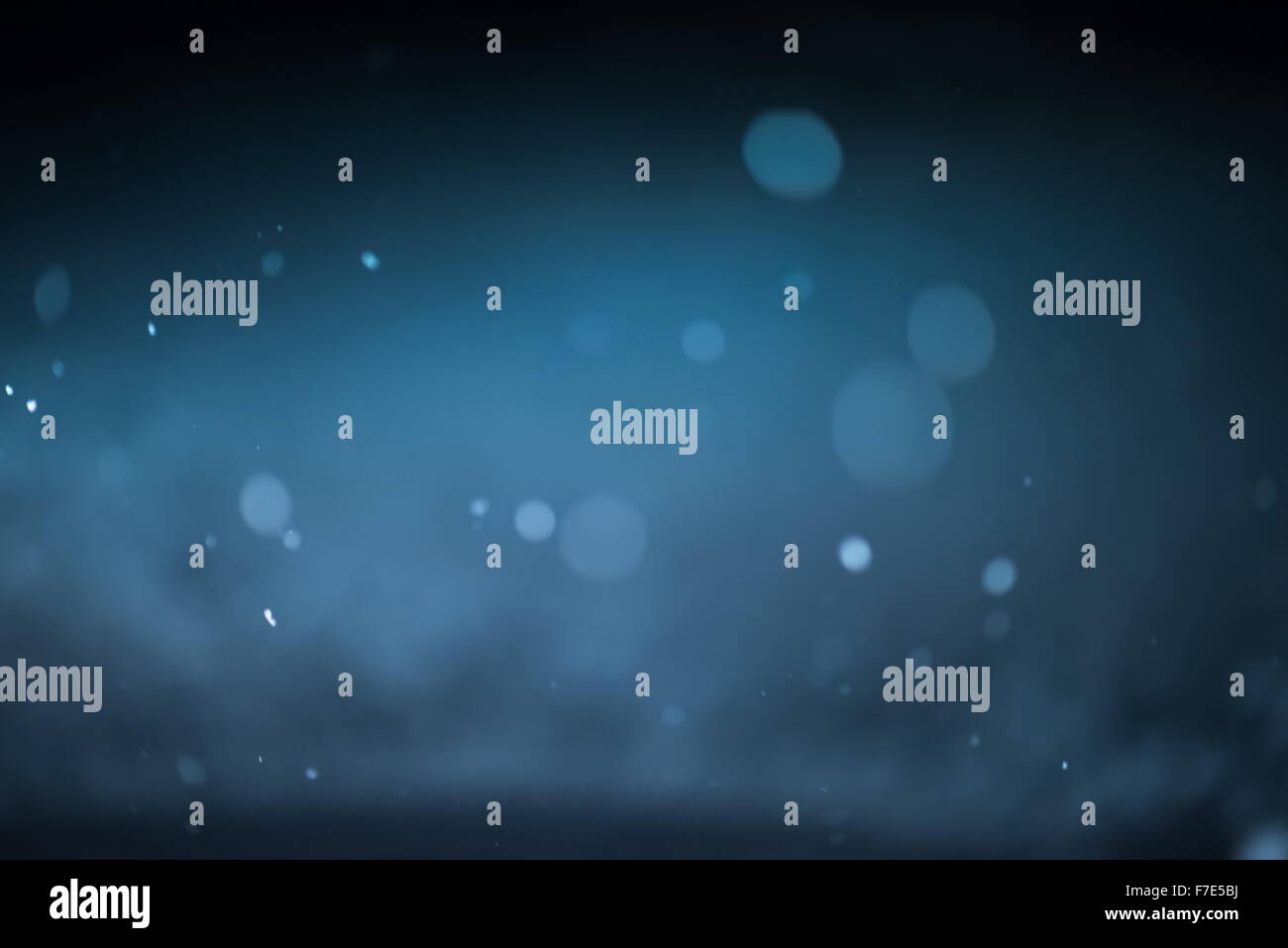 winter night scene, falling snow background snowflakes in blur over ...