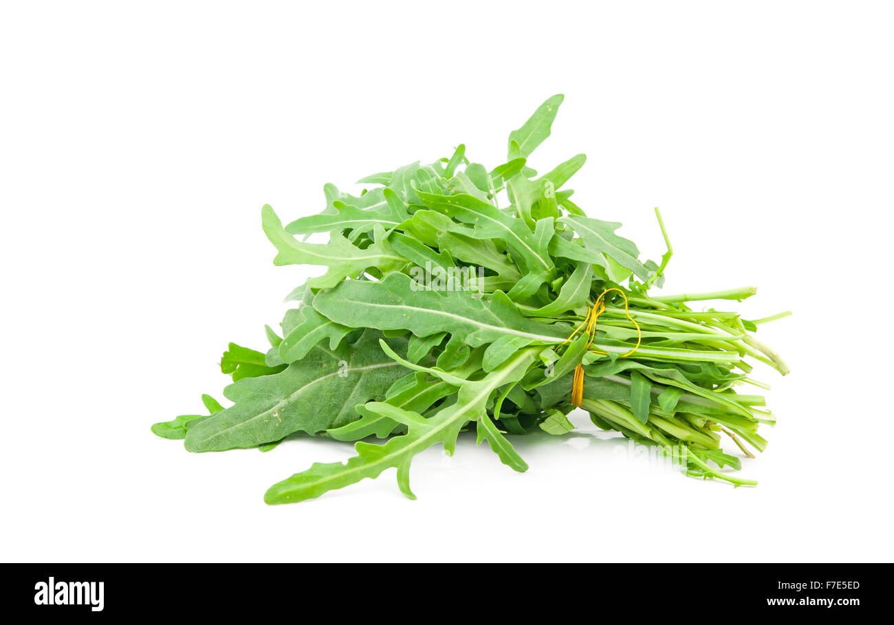 fresh arugula leaves on white background Stock Photo - Alamy