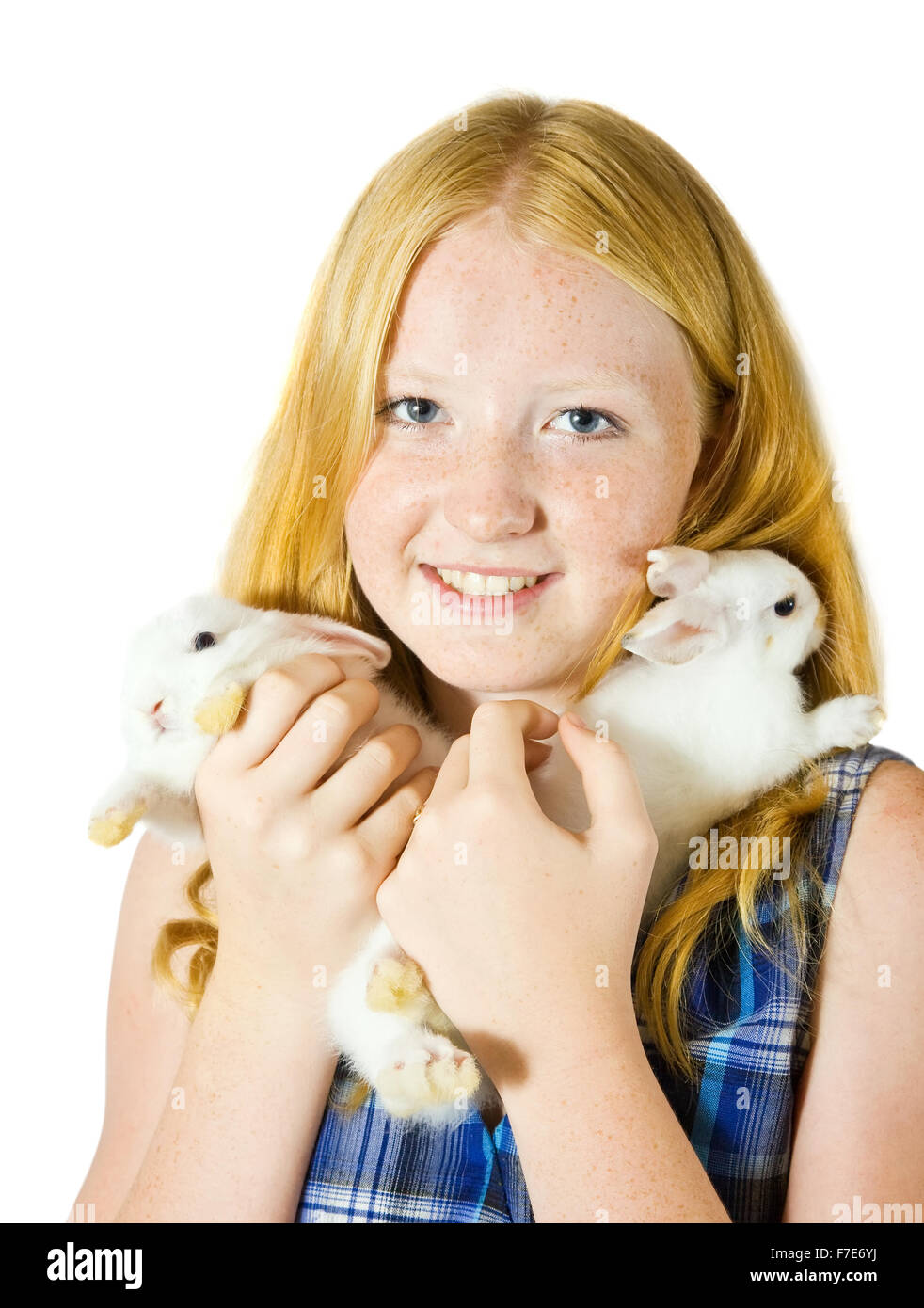 Teen girl with rabbits, isolated on white background Stock Photo - Alamy