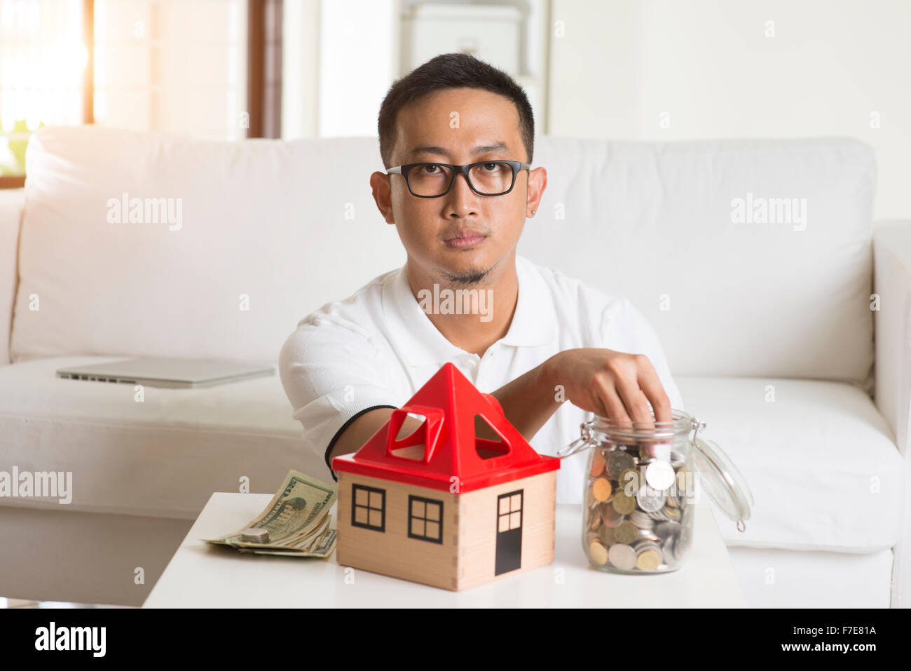 asian male house loan Stock Photo - Alamy