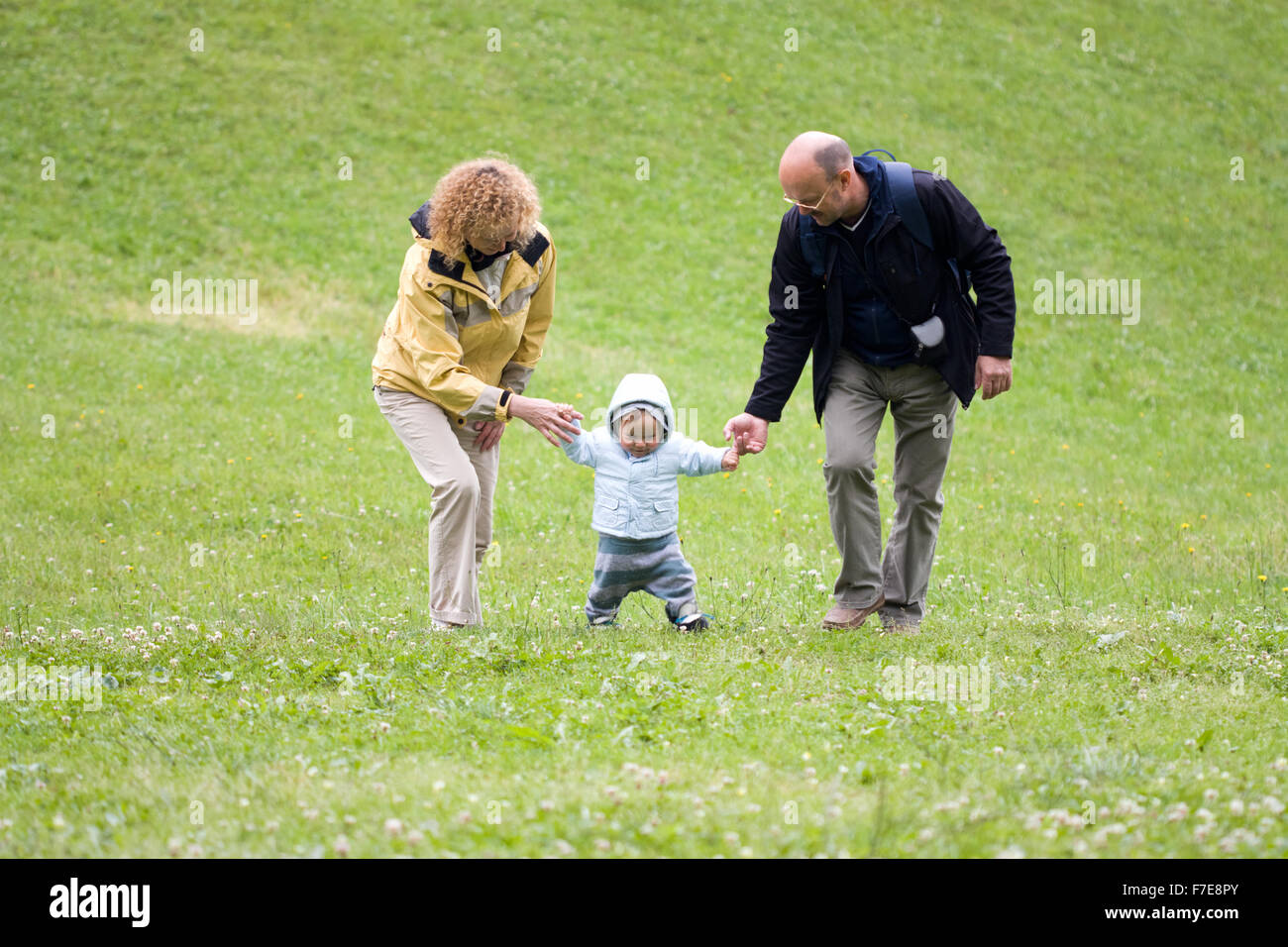 First steps with grandparents Stock Photo - Alamy