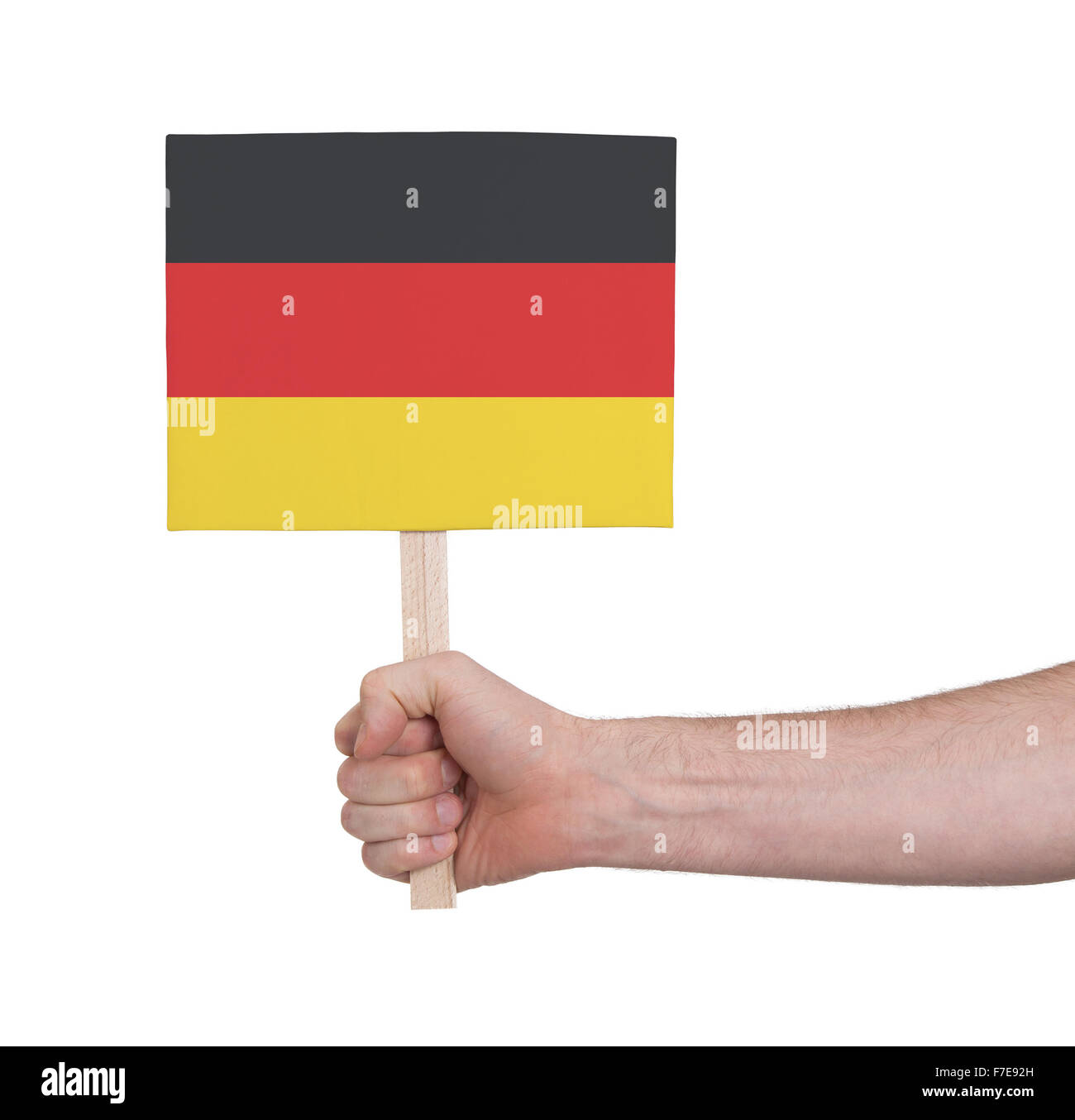 Hand holding german flag on hi-res stock photography and images - Alamy