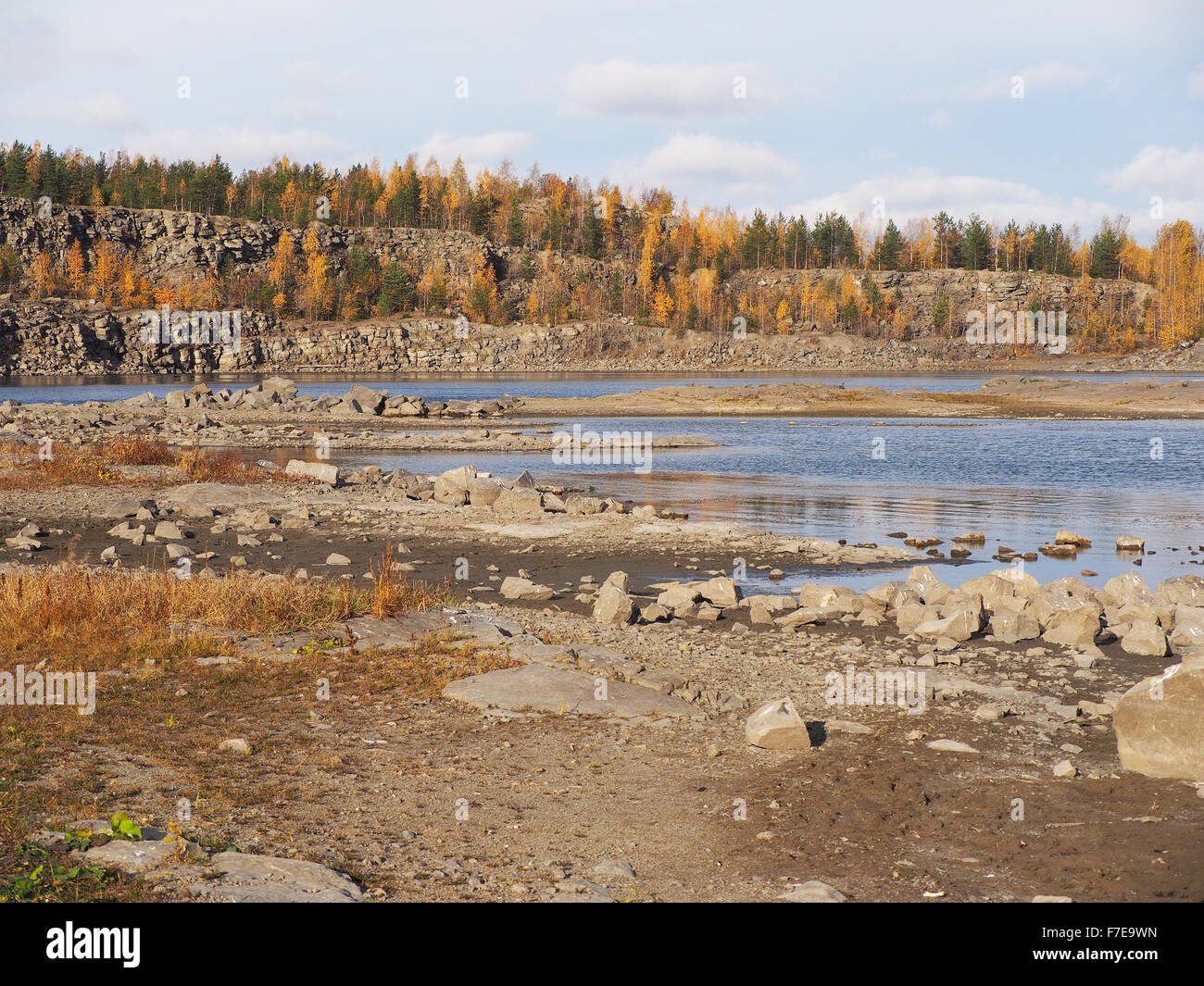 flooded quarry in autumn Stock Photo - Alamy