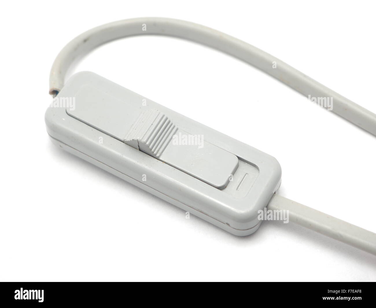 Switch from a table lamp on a white background Stock Photo - Alamy