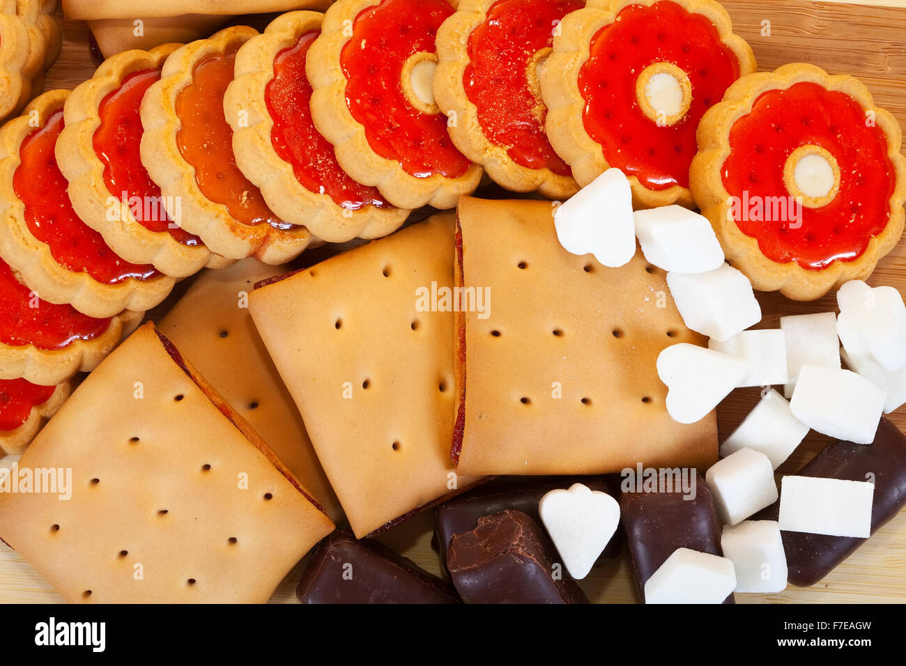 various cookies and chocolate candy with sugar Stock Photo - Alamy