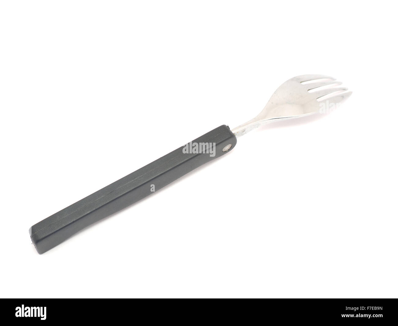 Folding travel fork on a white background Stock Photo - Alamy