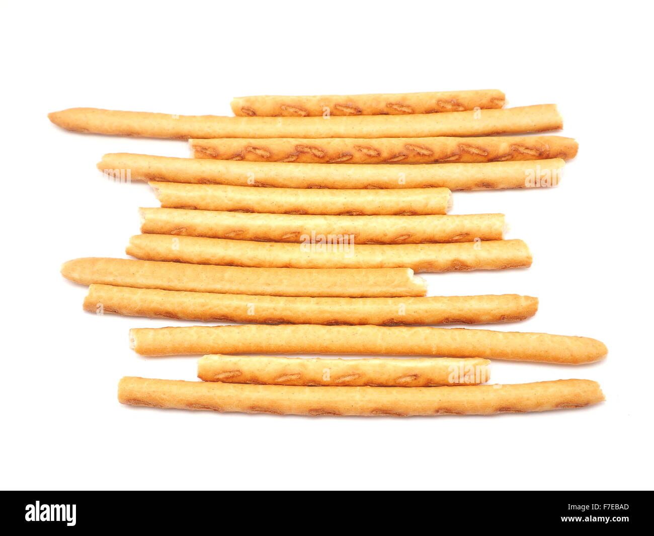 sweet flour straws on a white background Stock Photo - Alamy