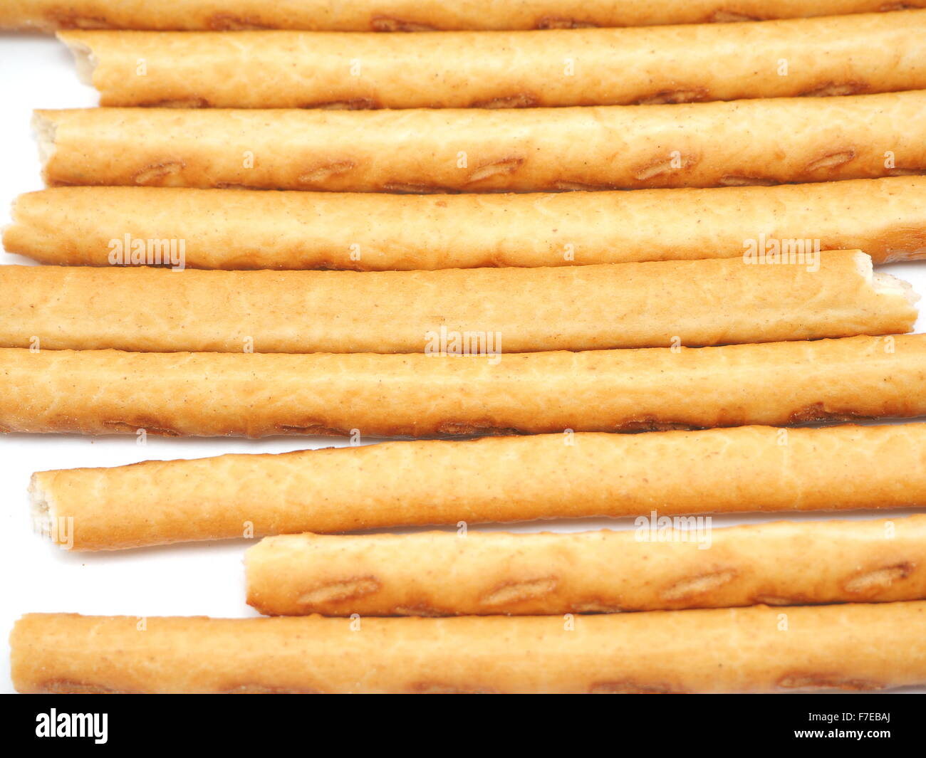 sweet flour straws on a white background Stock Photo - Alamy