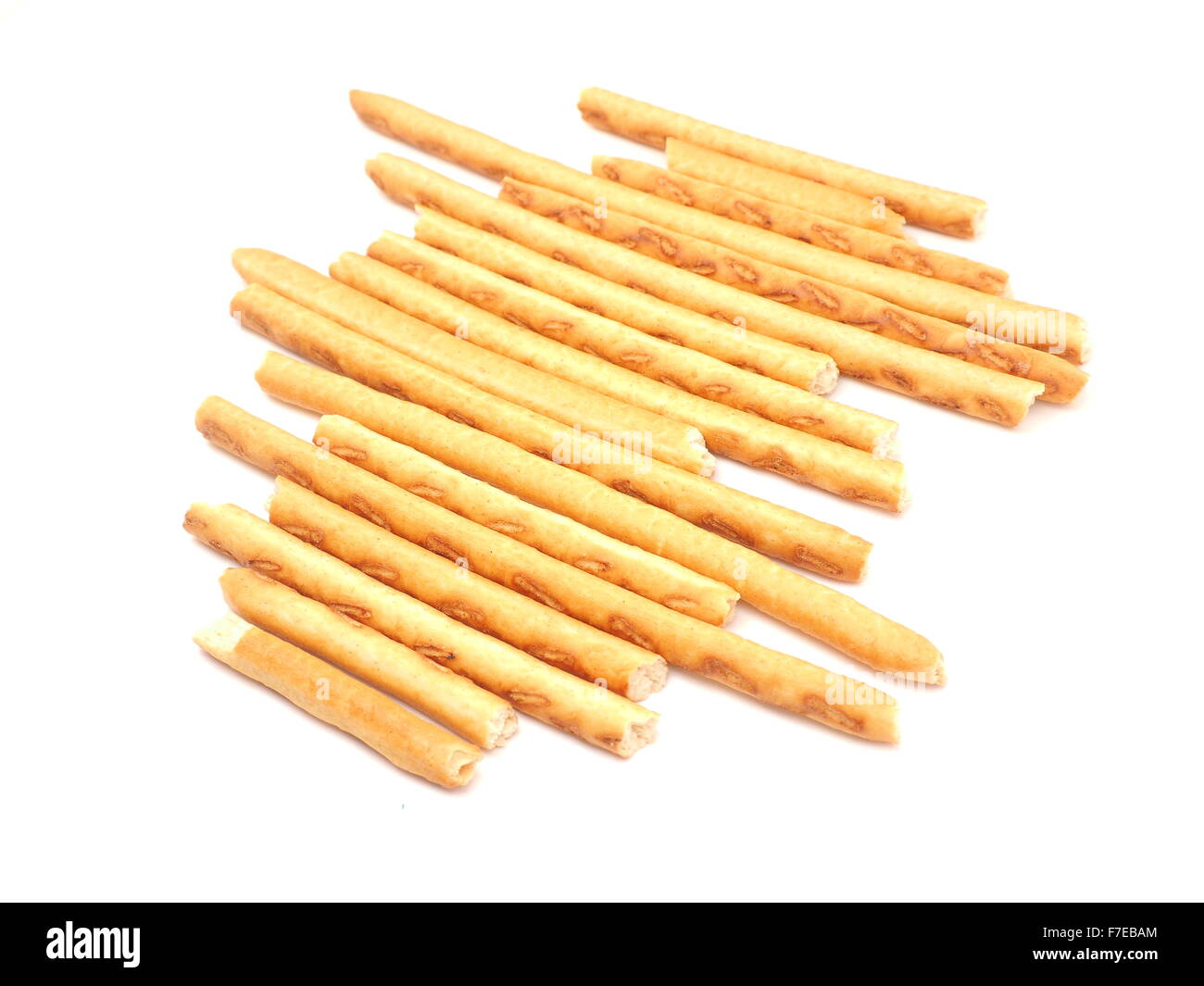 sweet flour straws on a white background Stock Photo - Alamy