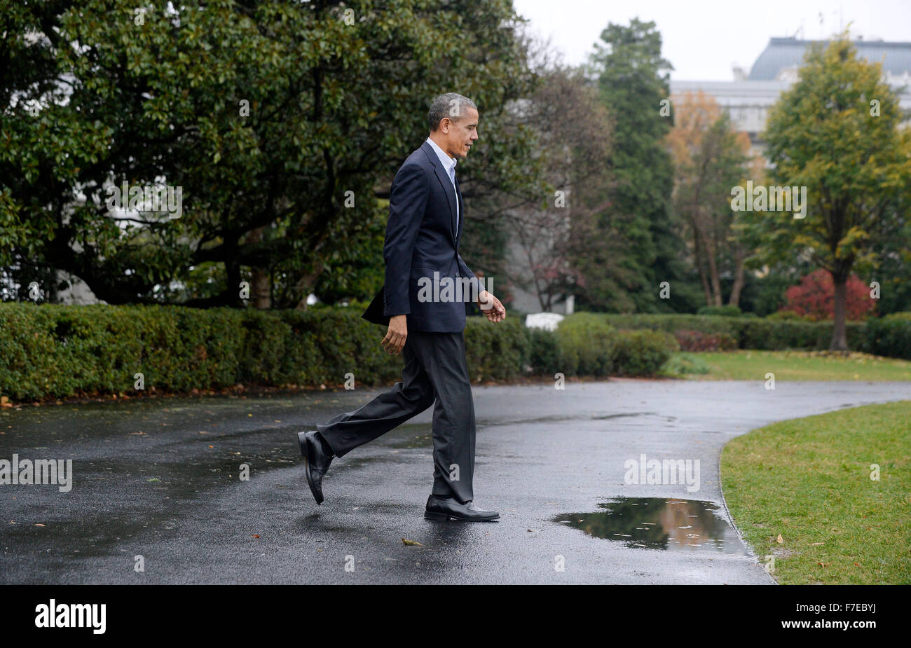 United States President Barack Obama walks across the South Lawn before ...