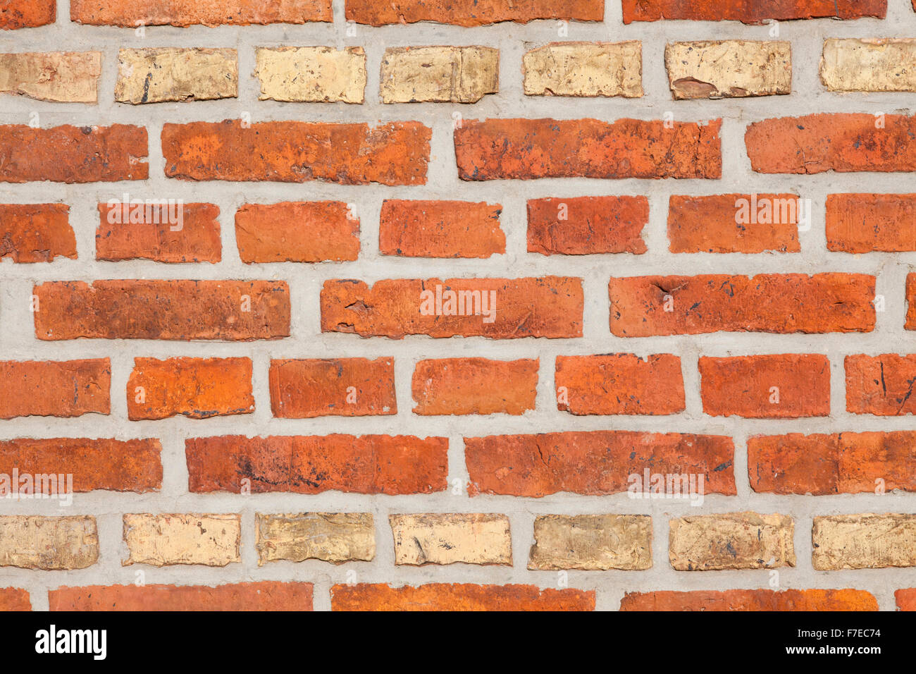 red and yellow brick wall texture or contruction background Stock Photo ...