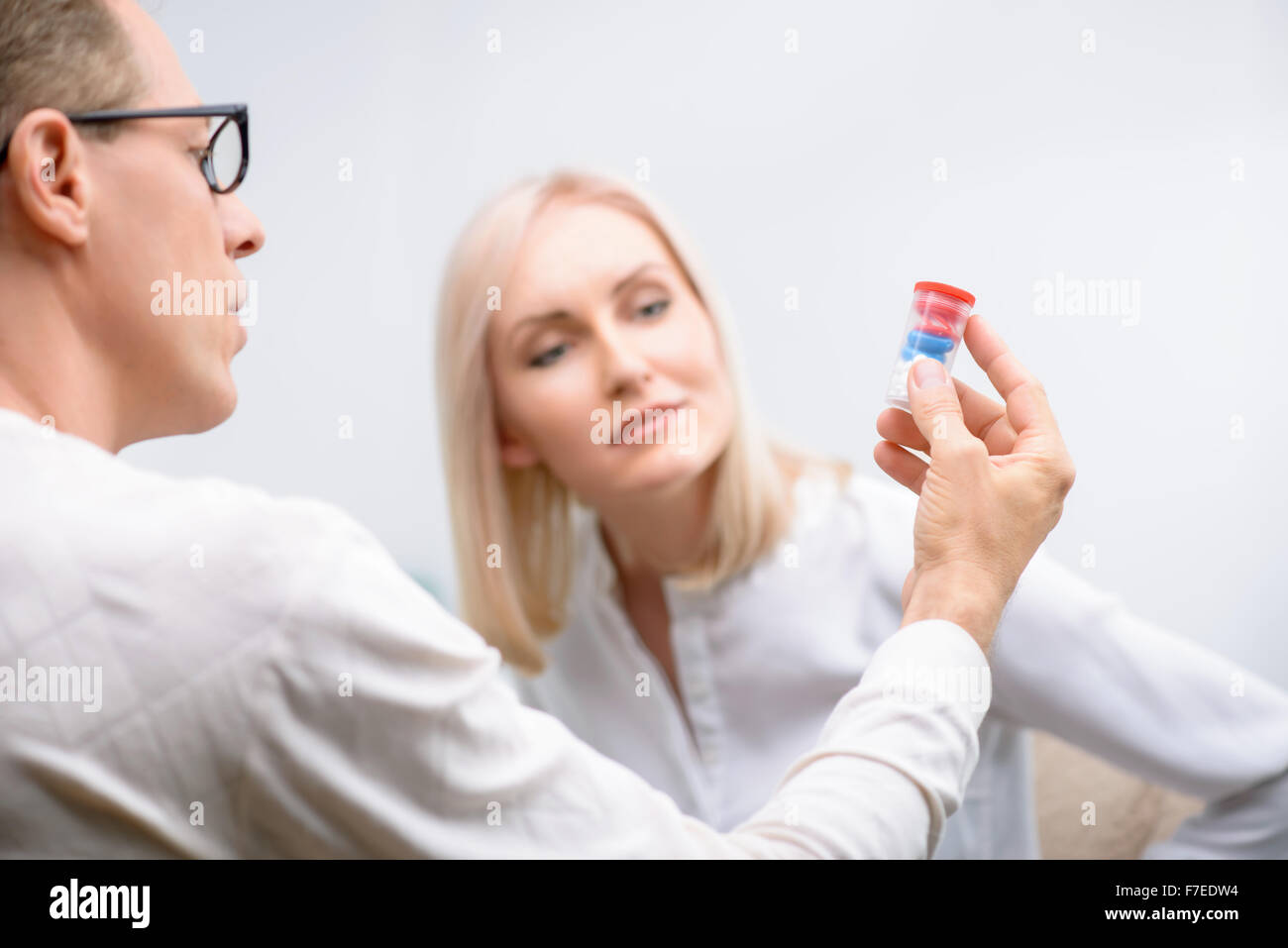 Woman speaking with psychologist Stock Photo - Alamy