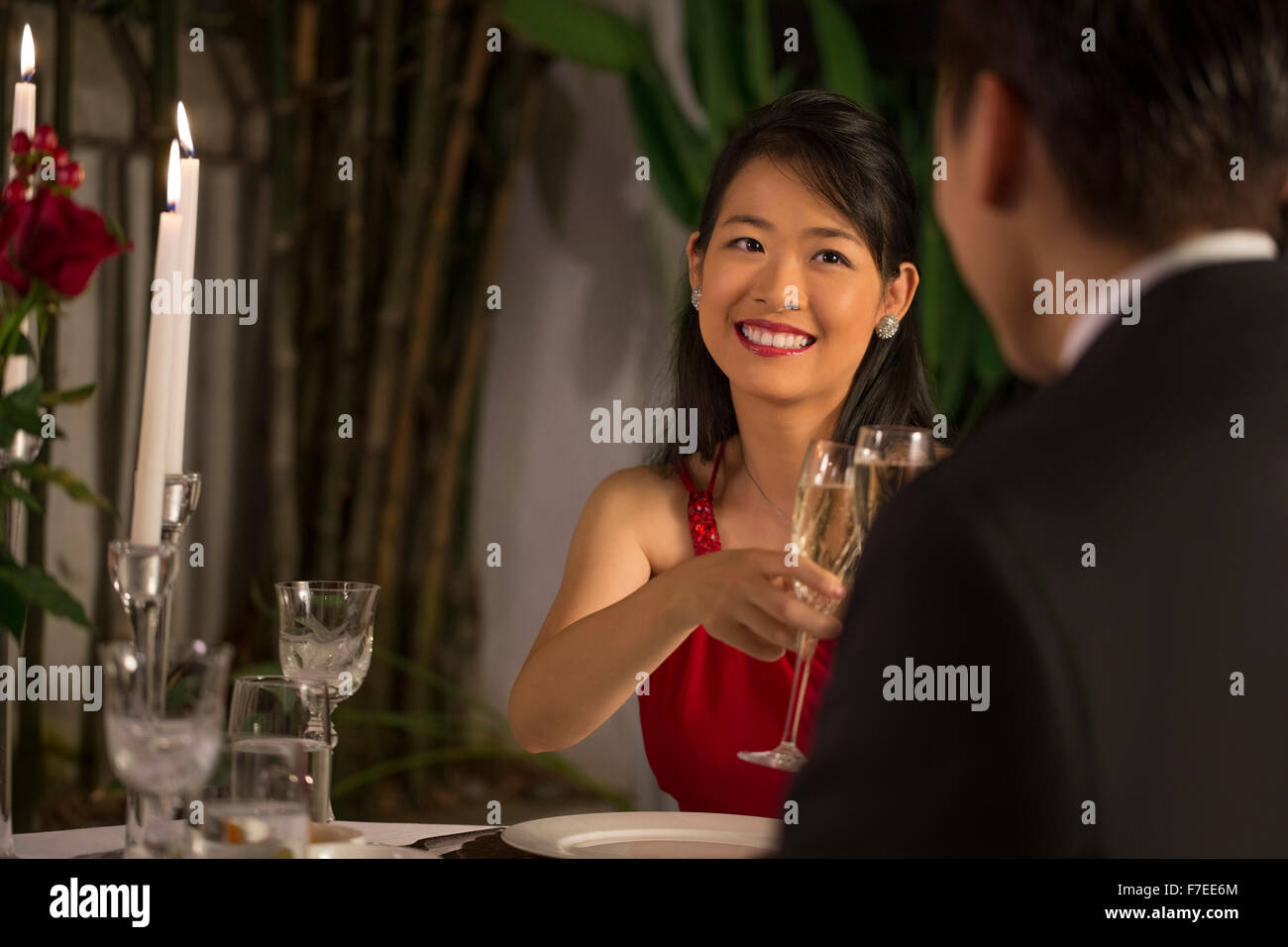 Singapore, Woman and man at formal dinner in restaurant Stock Photo - Alamy