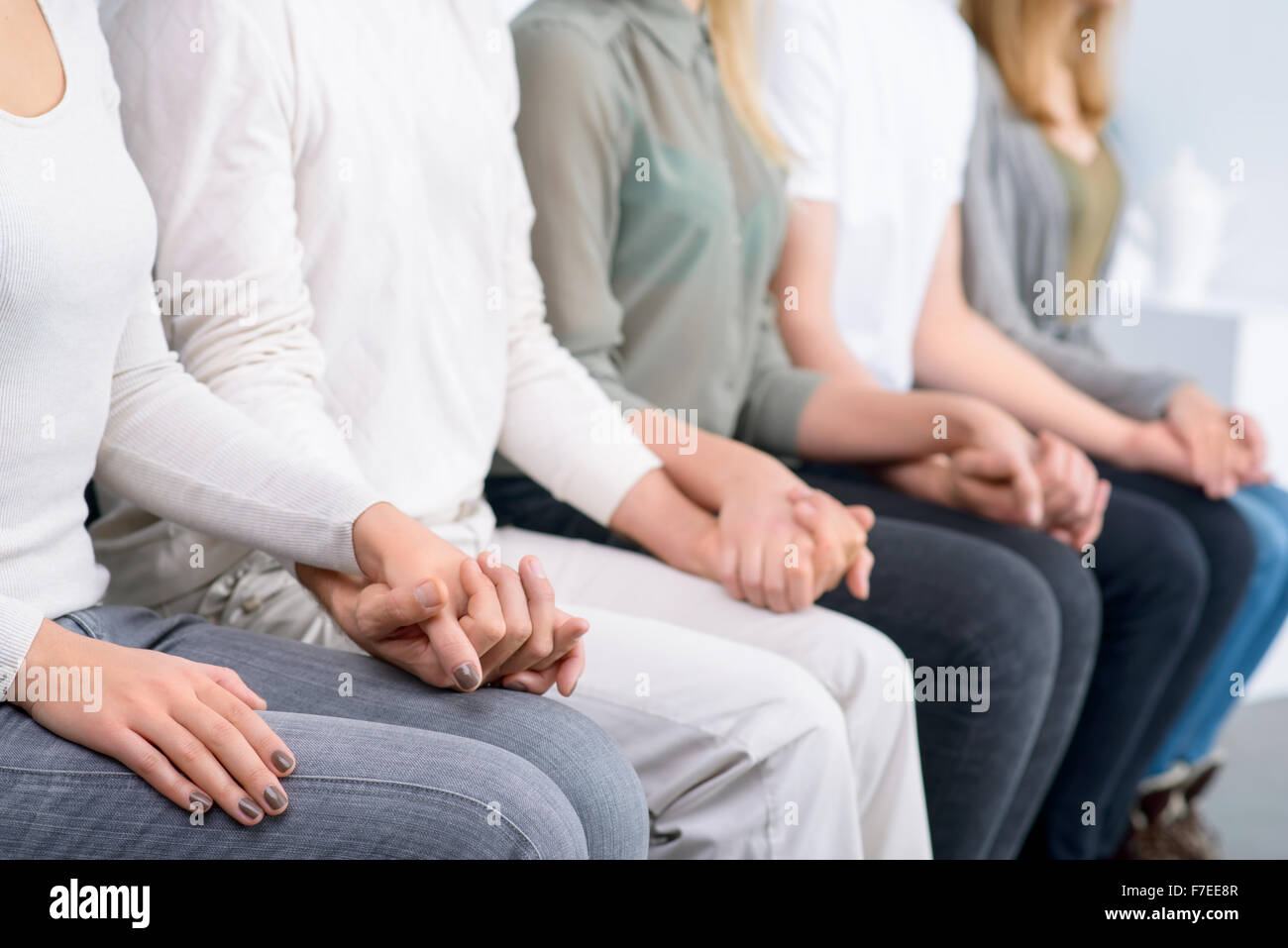 Psychologist working with group of people Stock Photo - Alamy