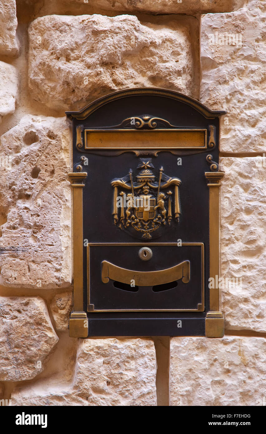 Black post boxes on the old wall at european town Stock Photo - Alamy