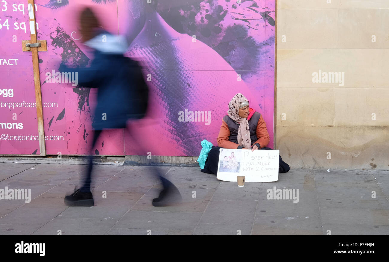 Beggar outside bank hi-res stock photography and images - Alamy